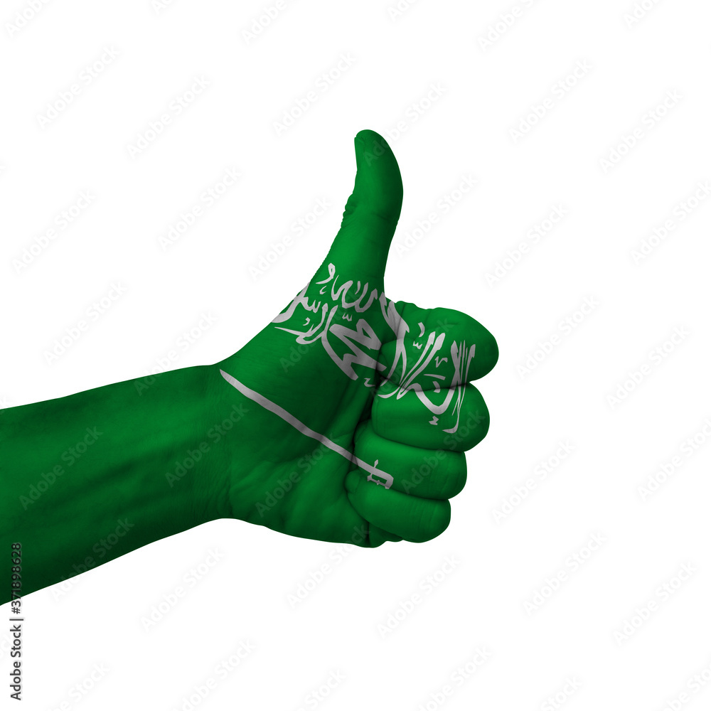 Hand making thumbs up sign, saudi arabia painted with flag as symbol of ...