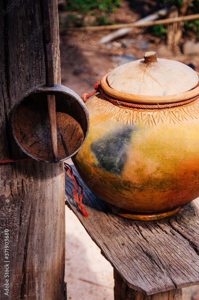 Thai style ceramic water pot with lid and water dipper made from ...