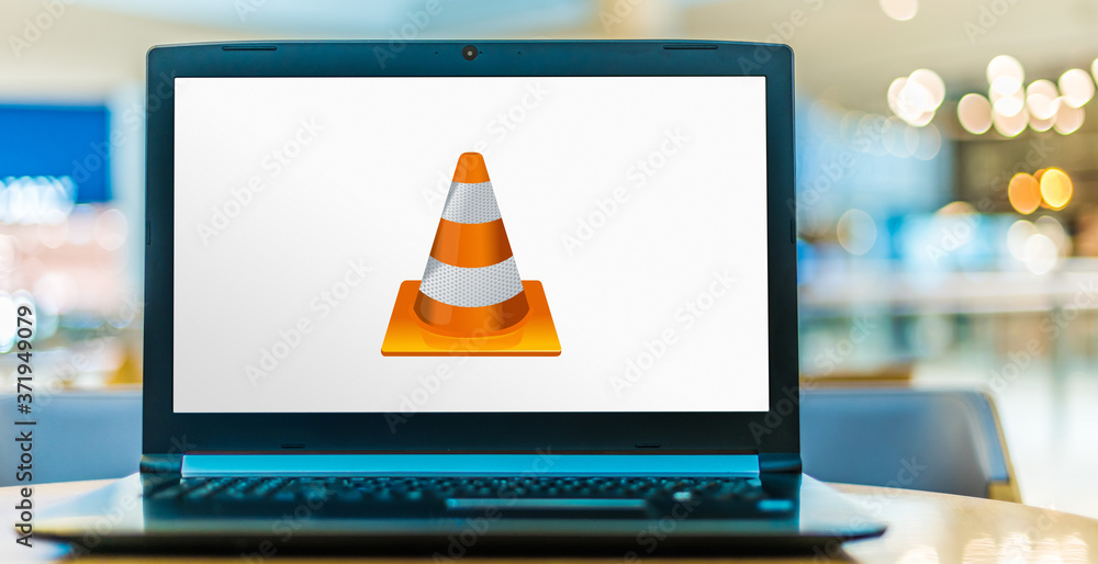 Laptop computer displaying logo of VLC media player Stock Photo | Adobe ...