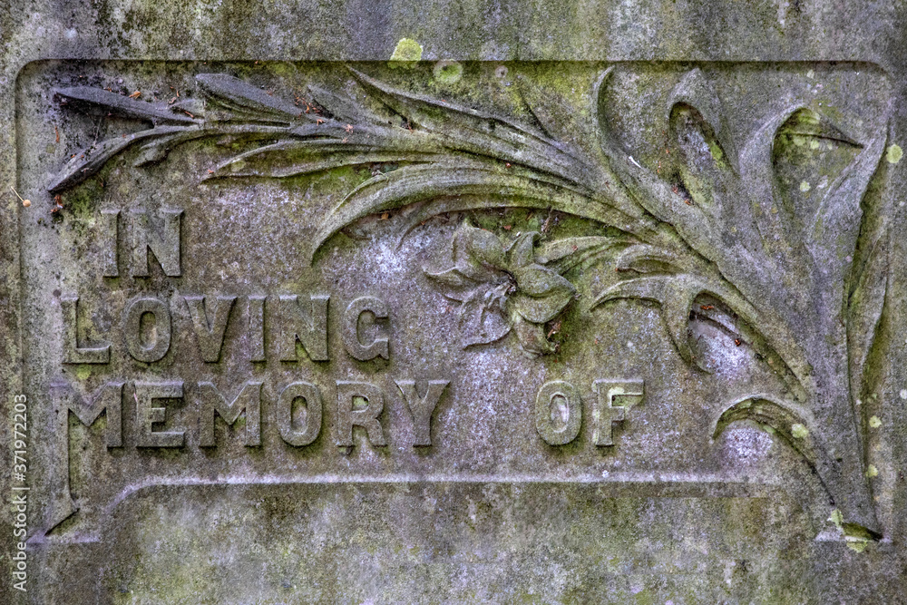 In Loving Memory of - written on a headstone in a graveyard. Stock ...