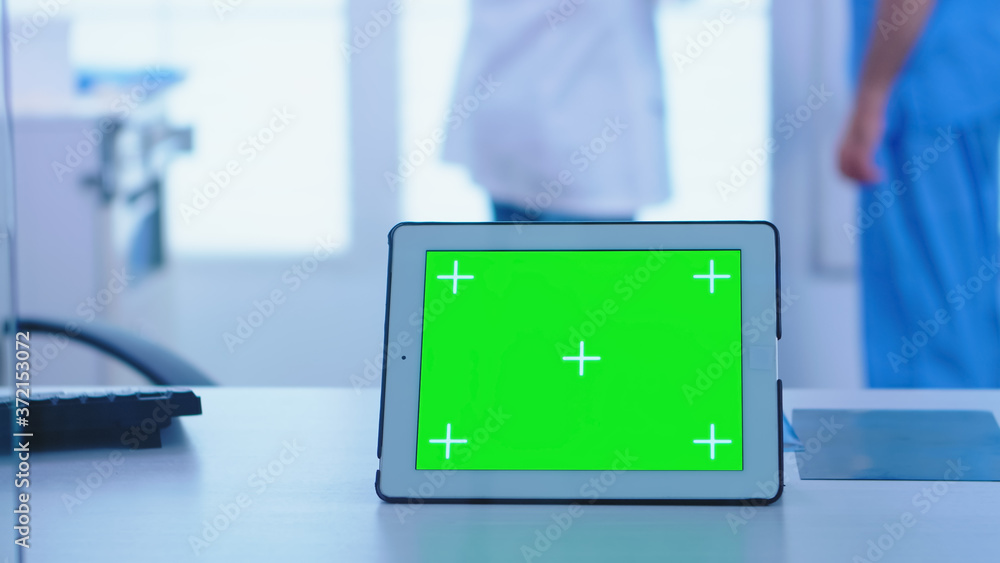 Tablet computer with copy space available in doctor cabinet. Assistant ...