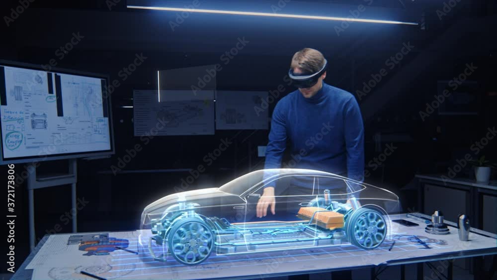 Automotive Engineer Wearing Virtual Reality Headset Working on 3D ...