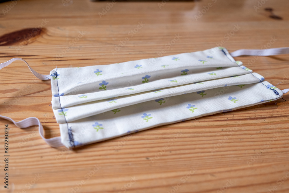 A side view of a finished homemade face mask as it is now compulsory to ...