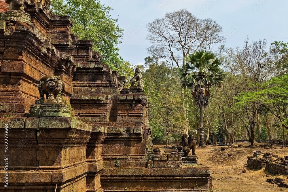 Ruins of an ancient temple, Cambodia. A building of red stones in the ...
