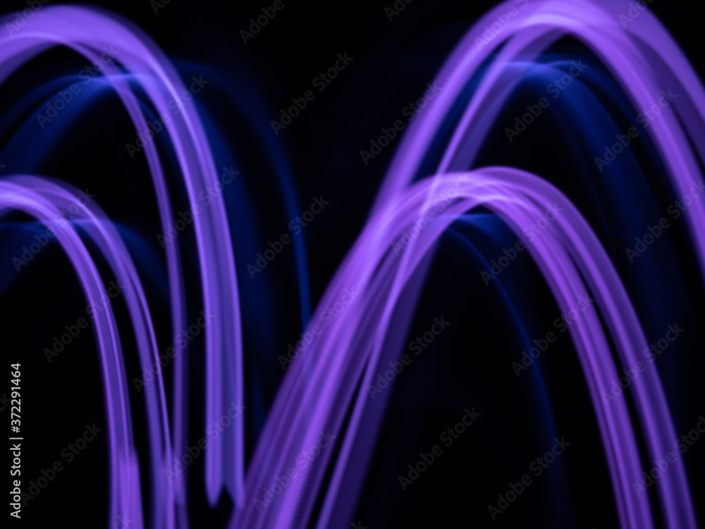 defocused purple neon lighting len flare wave pattern background in low ...