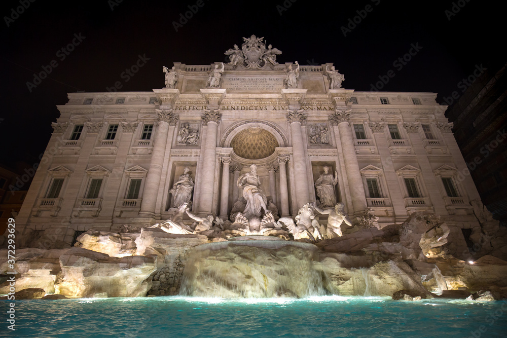 Beautiful view of the Trevi Fountain at night. The largest baroque ...