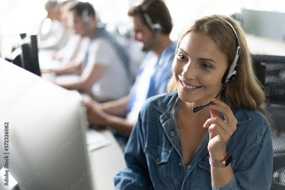 How can I help you? Beautiful call center workers in headphones are ...