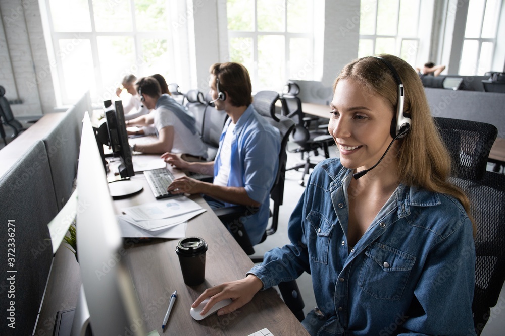 How can I help you? Beautiful call center workers in headphones are ...