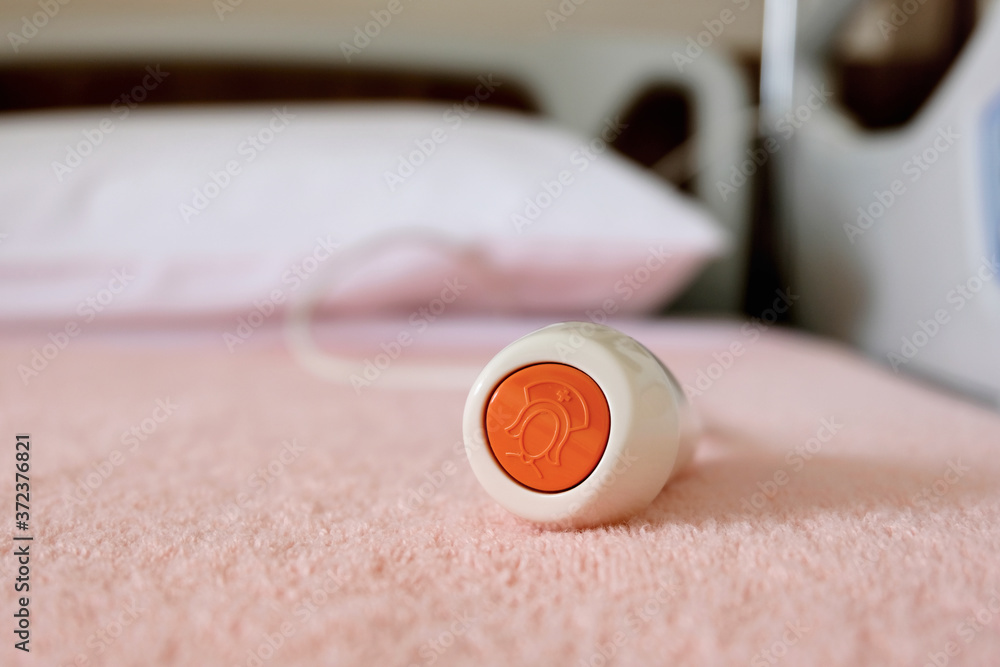Nurse call button on a hospital bed for patients to request nurses ...