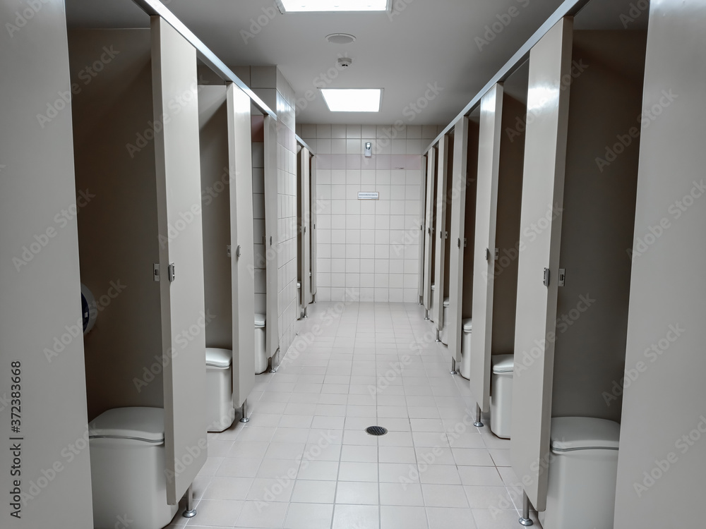 Clean restroom, public toilet in building,restroom,lavatory, doors ...