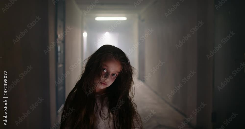 Little caucasian girl in ghost white sundress costume for halloween ...