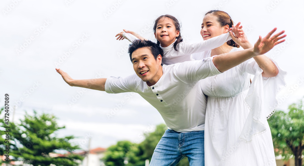 Portrait of enjoy happy love asian family father and mother holding ...