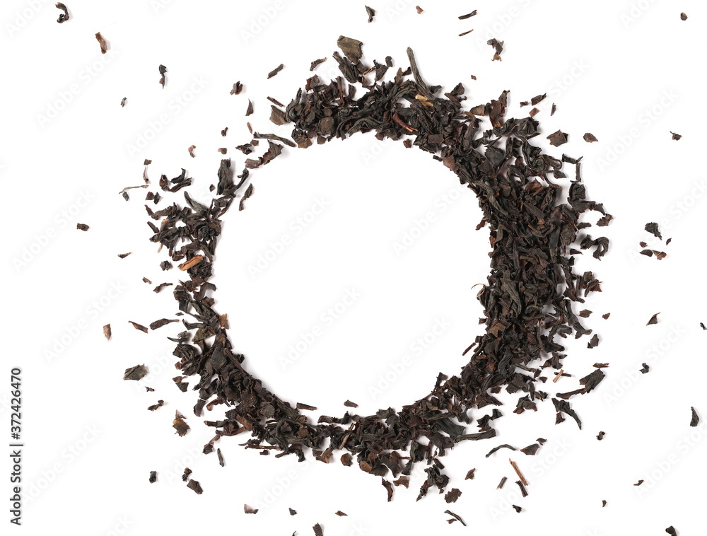 Dry black tea leaves round frame and border pile isolated on white ...