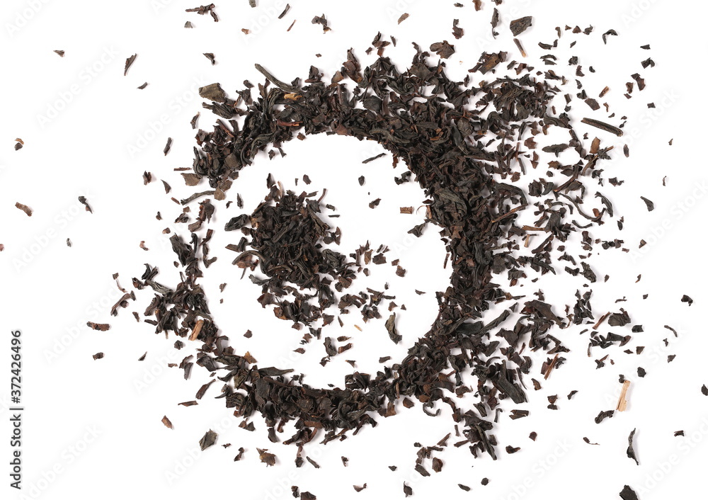 Dry black tea leaves round frame and border pile isolated on white ...