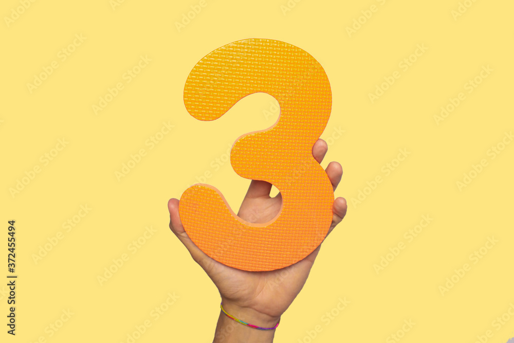 Concept of be the third one, third birthday, third place, losing. Hand ...