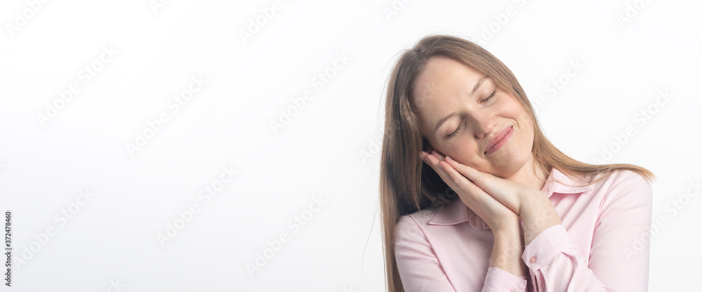 Tired girl with closed eyes expressing boredom and pretending asleep ...