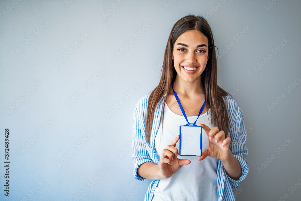 Woman wear blank ID badge mockup, stand isolated. Name tag on neck and ...