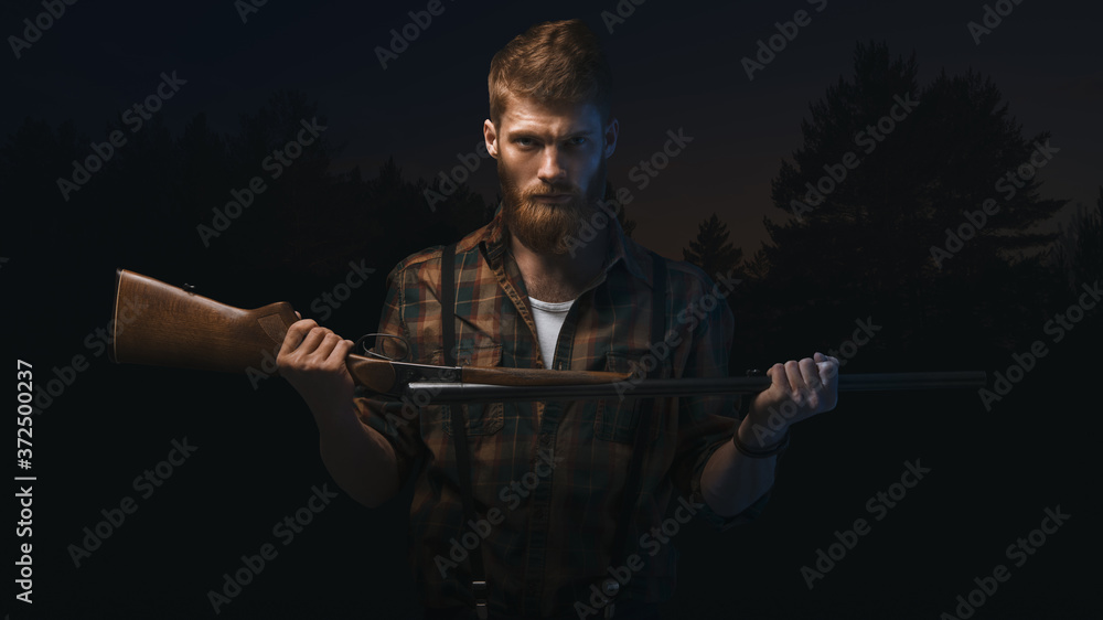 Angry man holding shotgun Stock-Foto | Adobe Stock