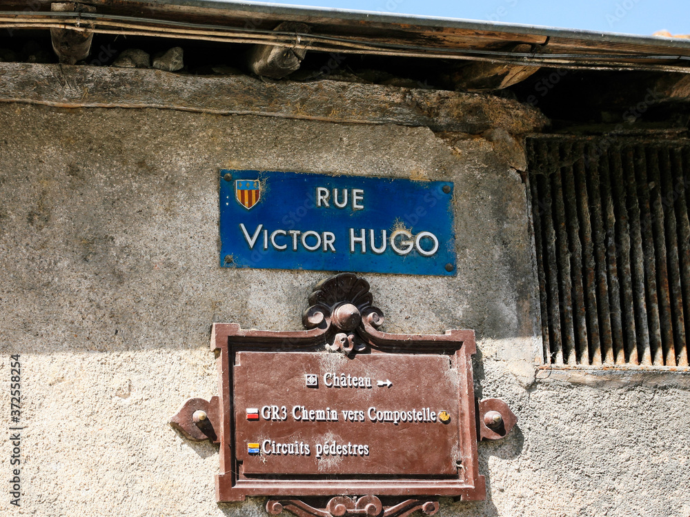 AMBOISE, FRANCE - JULY 8, 2010: street sign to the side of the castle ...