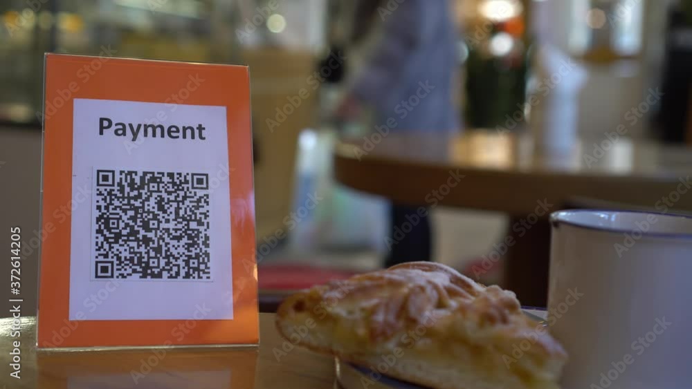 QR code payment display in the retail store. To use a QR code payment ...