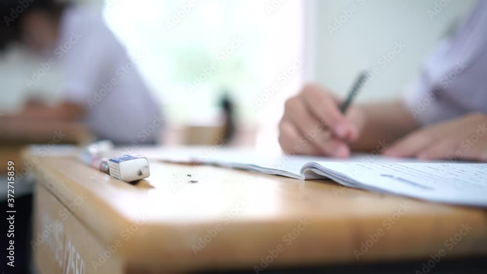 Student hand testing doing test exam with pencil drawing selected ...