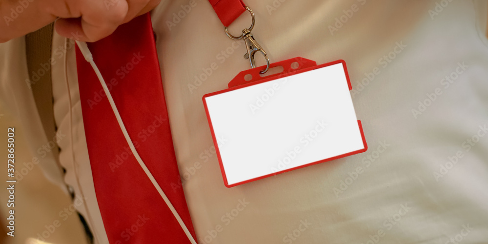 id card empty badge with mockup in red frame and lanyard on white shirt ...