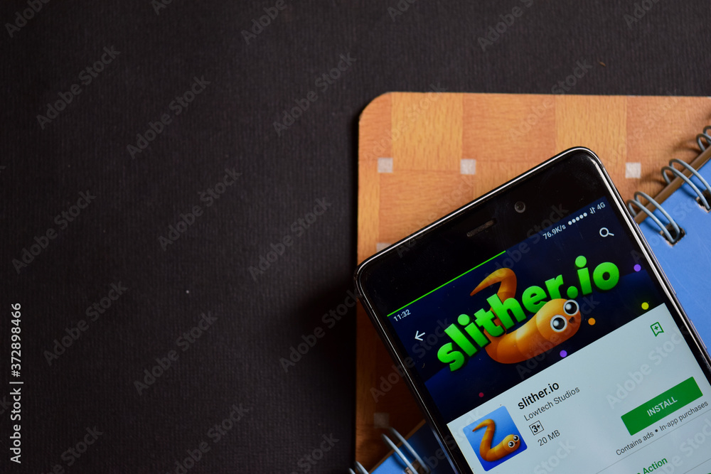 Slither.io dev app on Smartphone screen. Slither.io is a freeware web ...