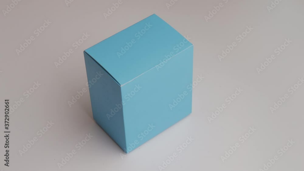 blue box mockup on empty white background Stock Video | Adobe Stock