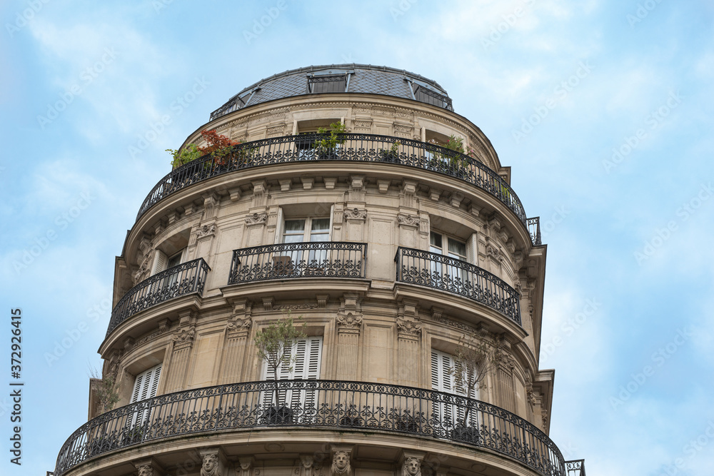 Typical old Paris architecture, facades of residential buildings with ...
