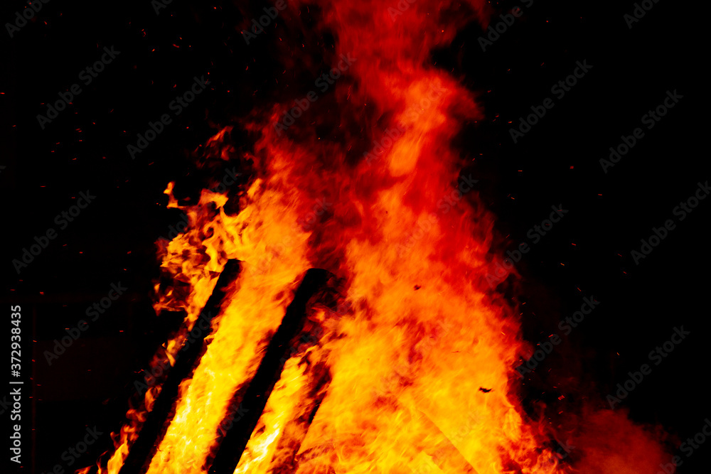 Bonfire of red fire made during the celebration of the feast of Sant ...