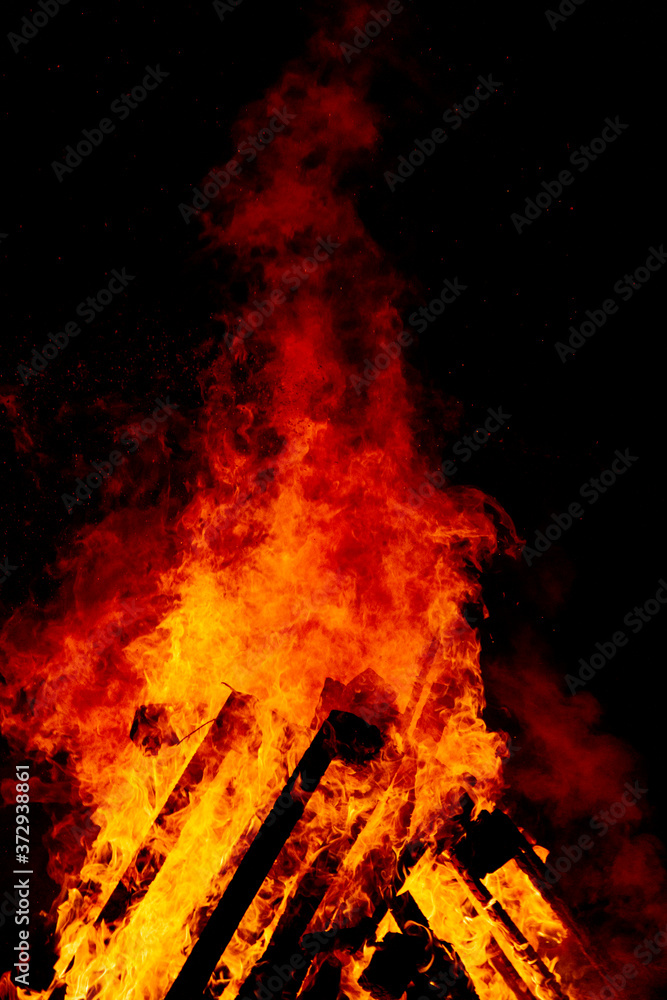 Bonfire of red fire made during the celebration of the feast of Sant ...