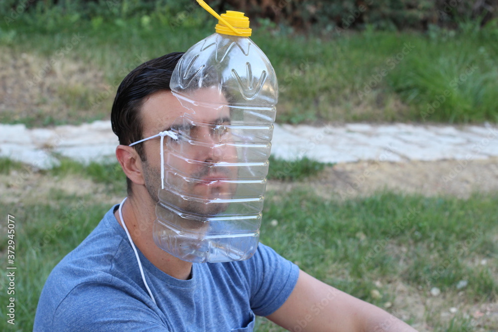 Homemade face shield reusing a plastic bottle Stock Photo | Adobe Stock