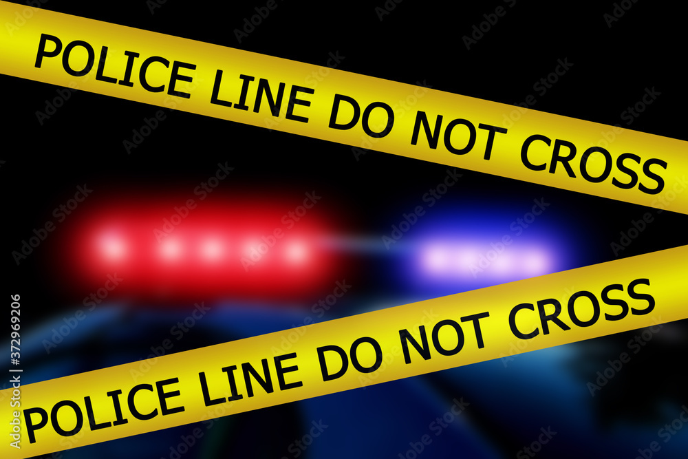 Red and blue lights of police car. Yellow police tape with text: police ...