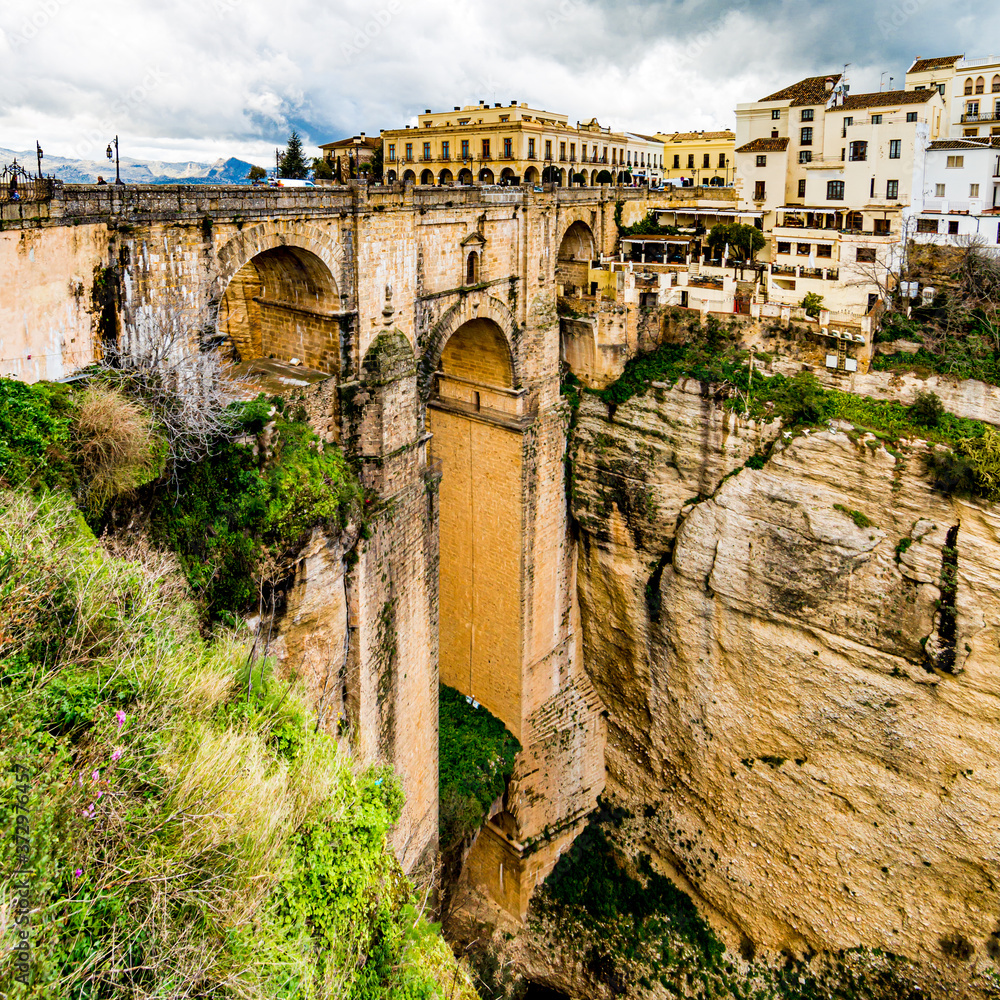 The New Bridge (Puente Nuevo) over the Guadalevin river, the town of ...