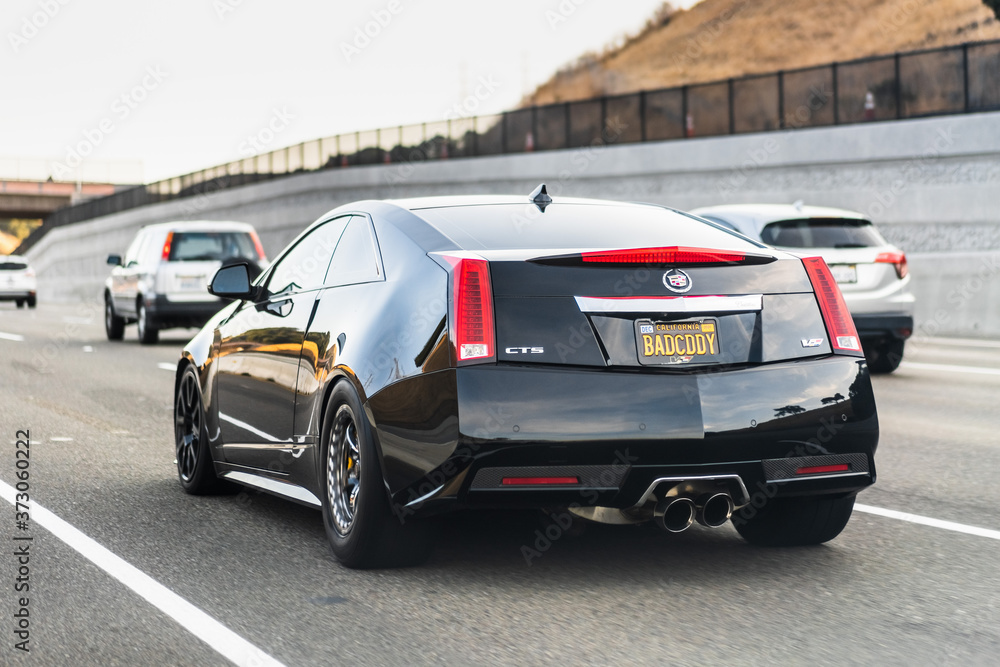 July 25, 2020 Fremont / CA / USA - Cadillac CTS-V coupe driving on the ...