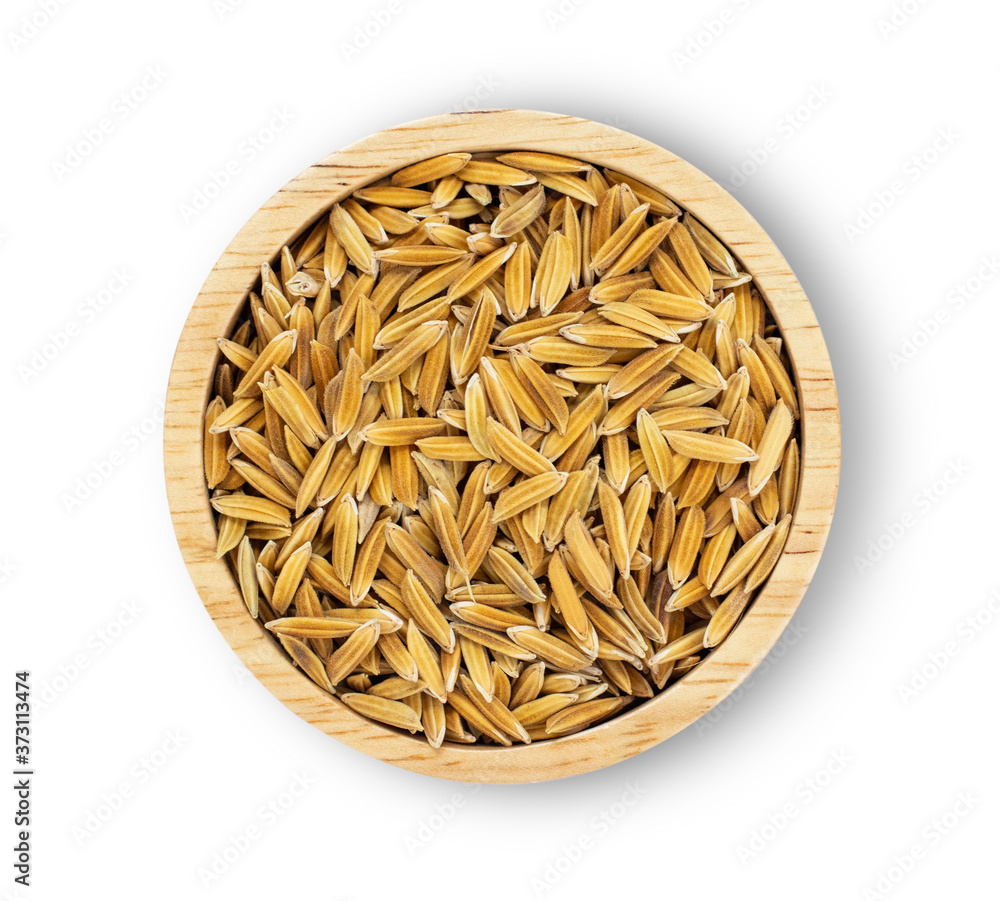 paddy rice or husked in wooden bowl isolated on white background Stock ...