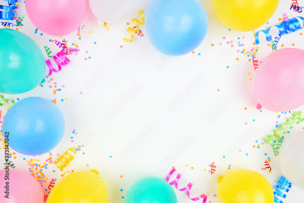 Birthday party theme frame on a white background. Top down view with ...
