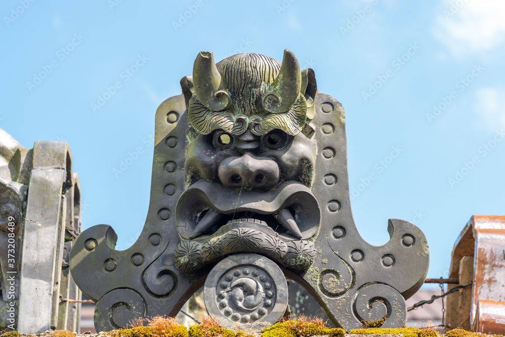 Japanese gargoyle, an ornament on the roof ridge, but also to scare ...