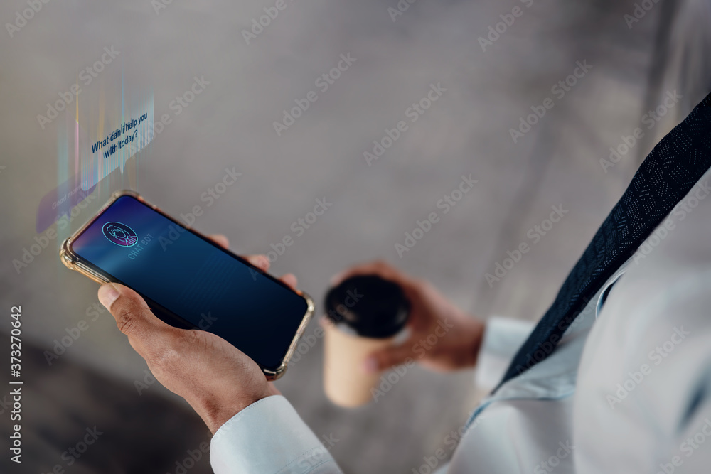 Chat Bot Technology Concept. Young Businessman Using Mobile Phone To ...