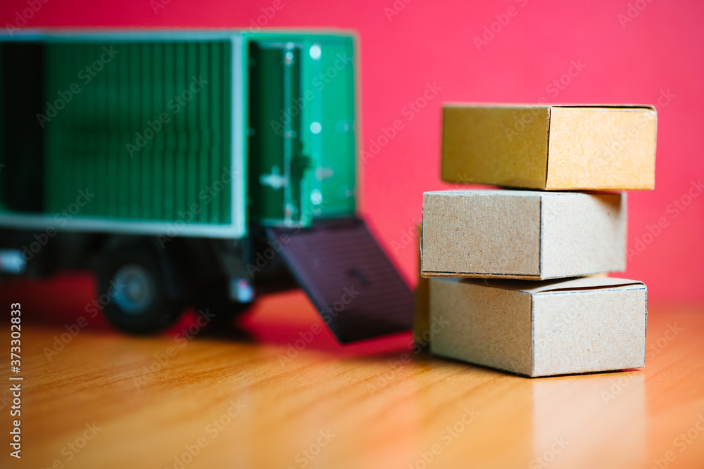 Miniature green logistic truck loading carton boxes using as logistic ...