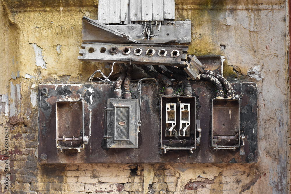 a view of an electrical circuit in an Indian building wall Stock Photo ...