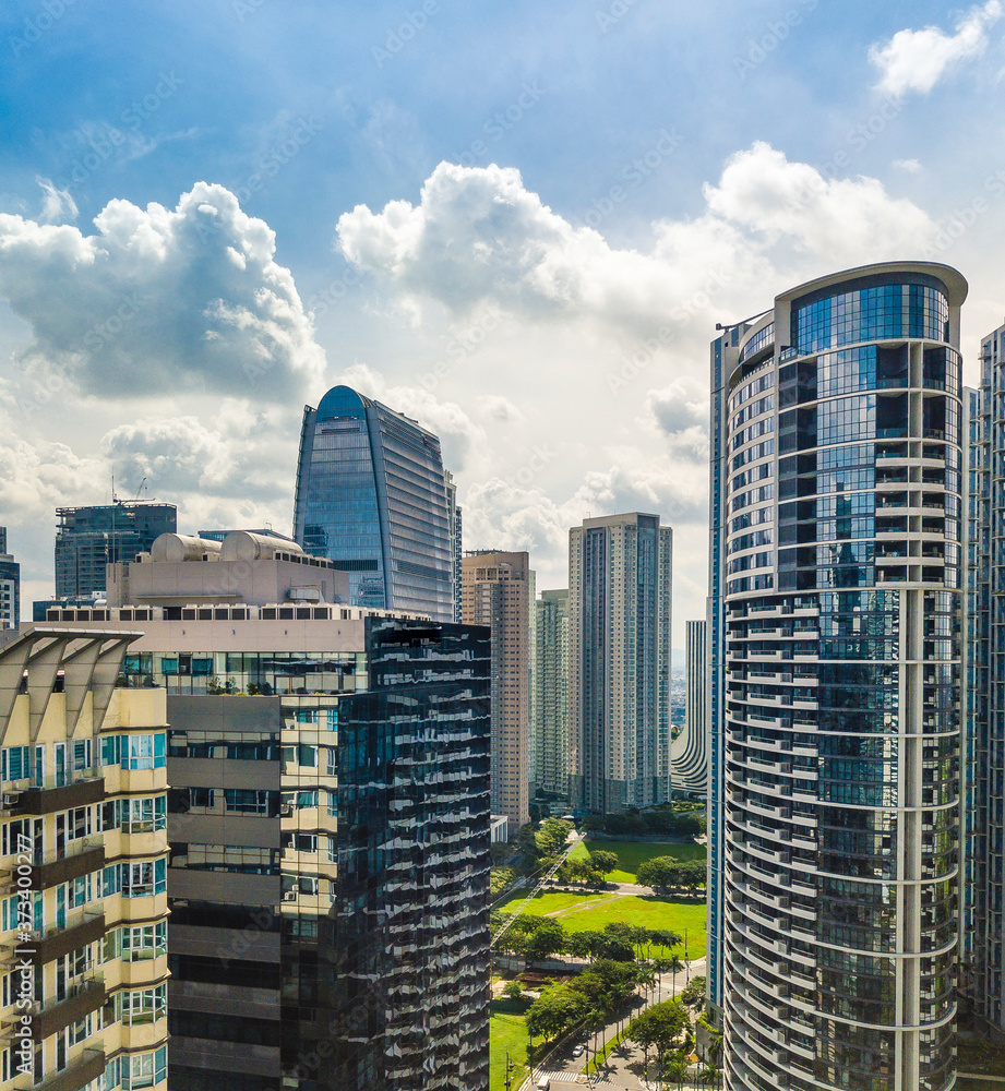 The skyline of Bonifacio Global city in Metro Manila. Drone shot of ...