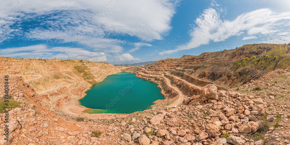 Spherical panorama of emerald lake in a flooded quarry. Emerald green ...