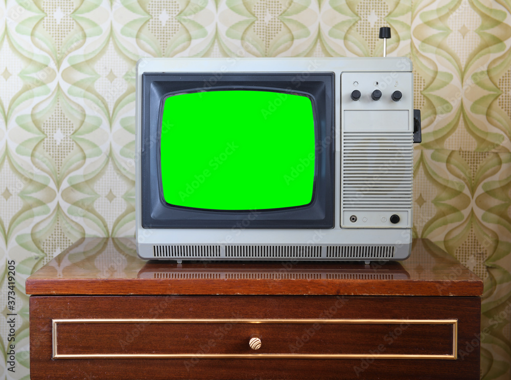 Old silver vintage TV with green screen for adding new images to the ...