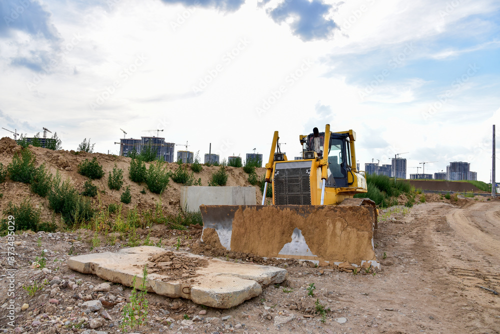 Dozer working at construction site. Bulldozer for land clearing ...