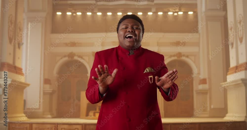 Crop view of african american man singing gospel song while looking to ...