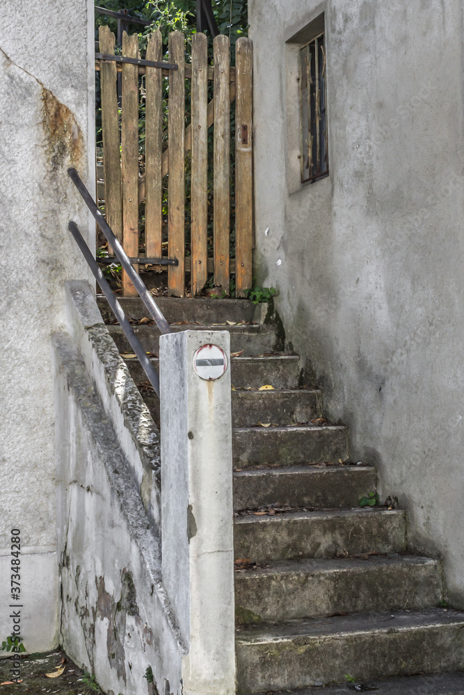 External staircase. Steps to a wooden gate. Porch of a private house ...