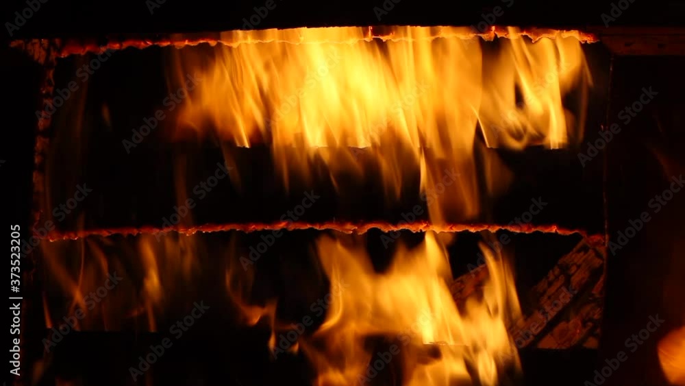 Burning wooden buildings close-up. Raging flames of fire. Firestorm ...