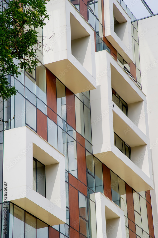 Foto de Color construction aluminum.Facing the building with a ...