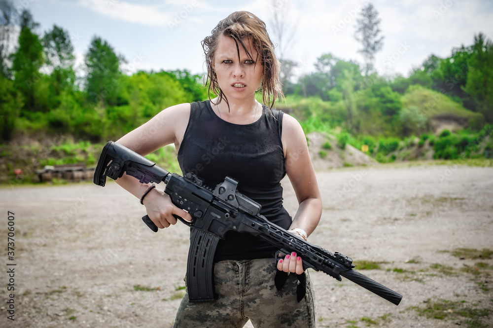 Woman With Machine Gun